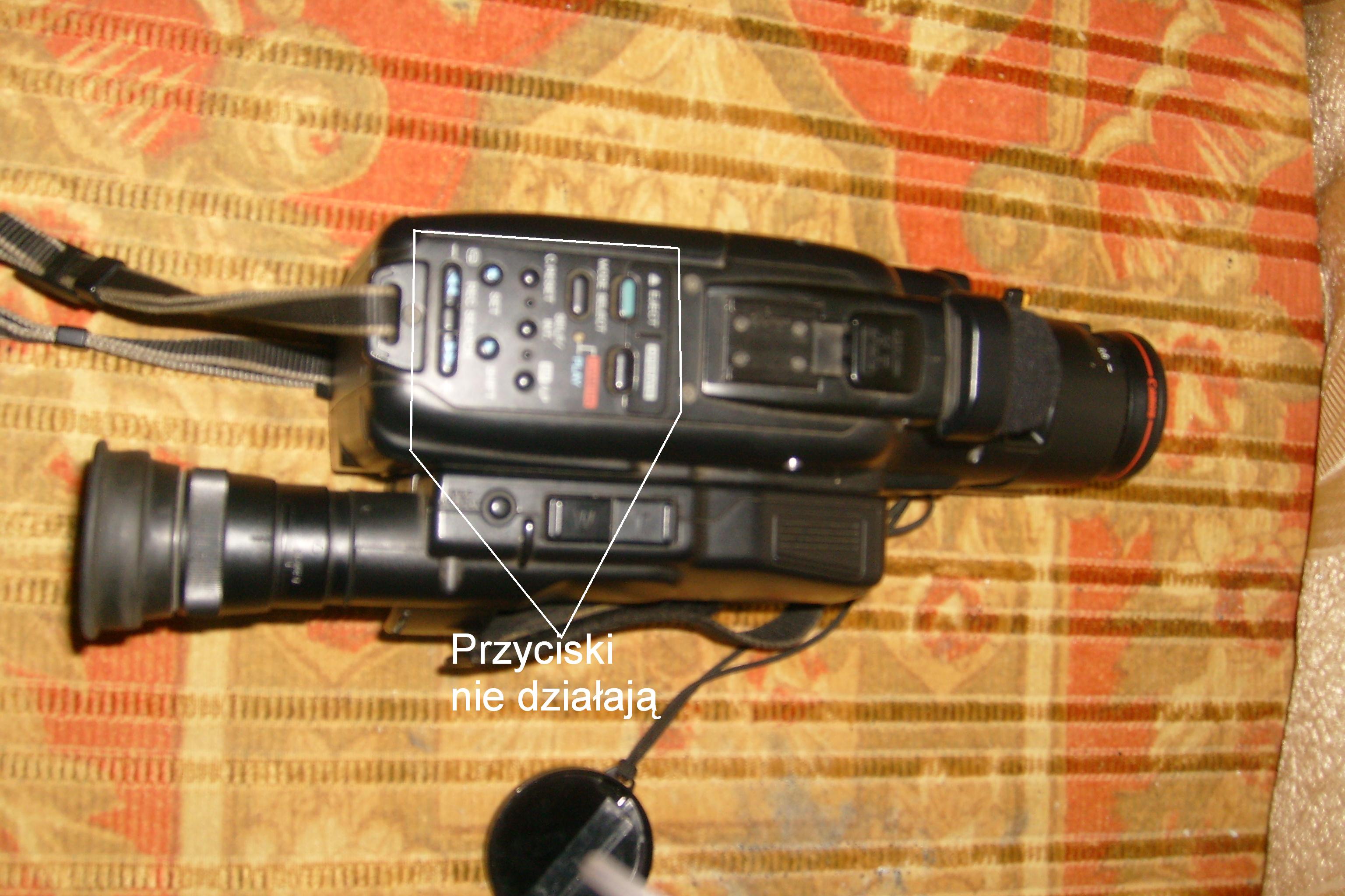 Canon E60 - szare tło i biały pasek w wizjerze, brak reakcji przycisków