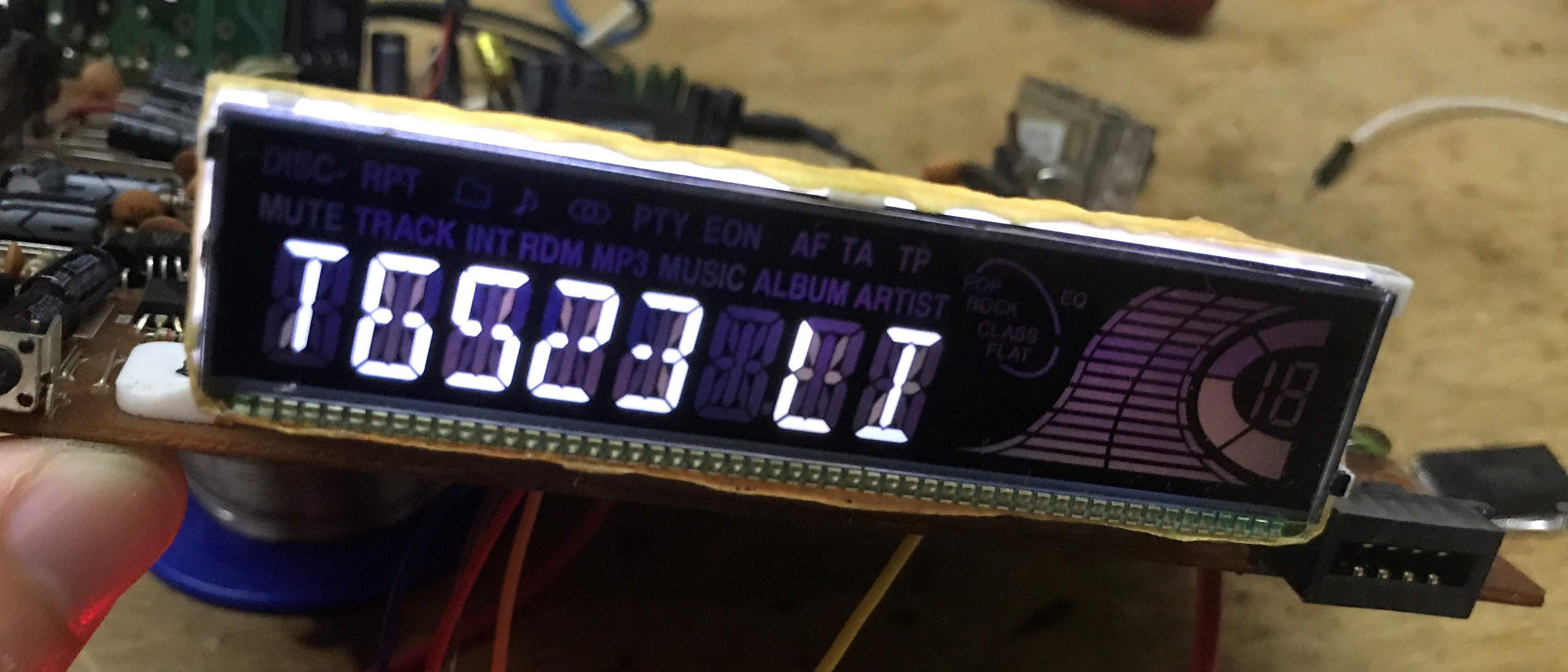 Inside a car radio, running LCD with PT6523 on Arduino