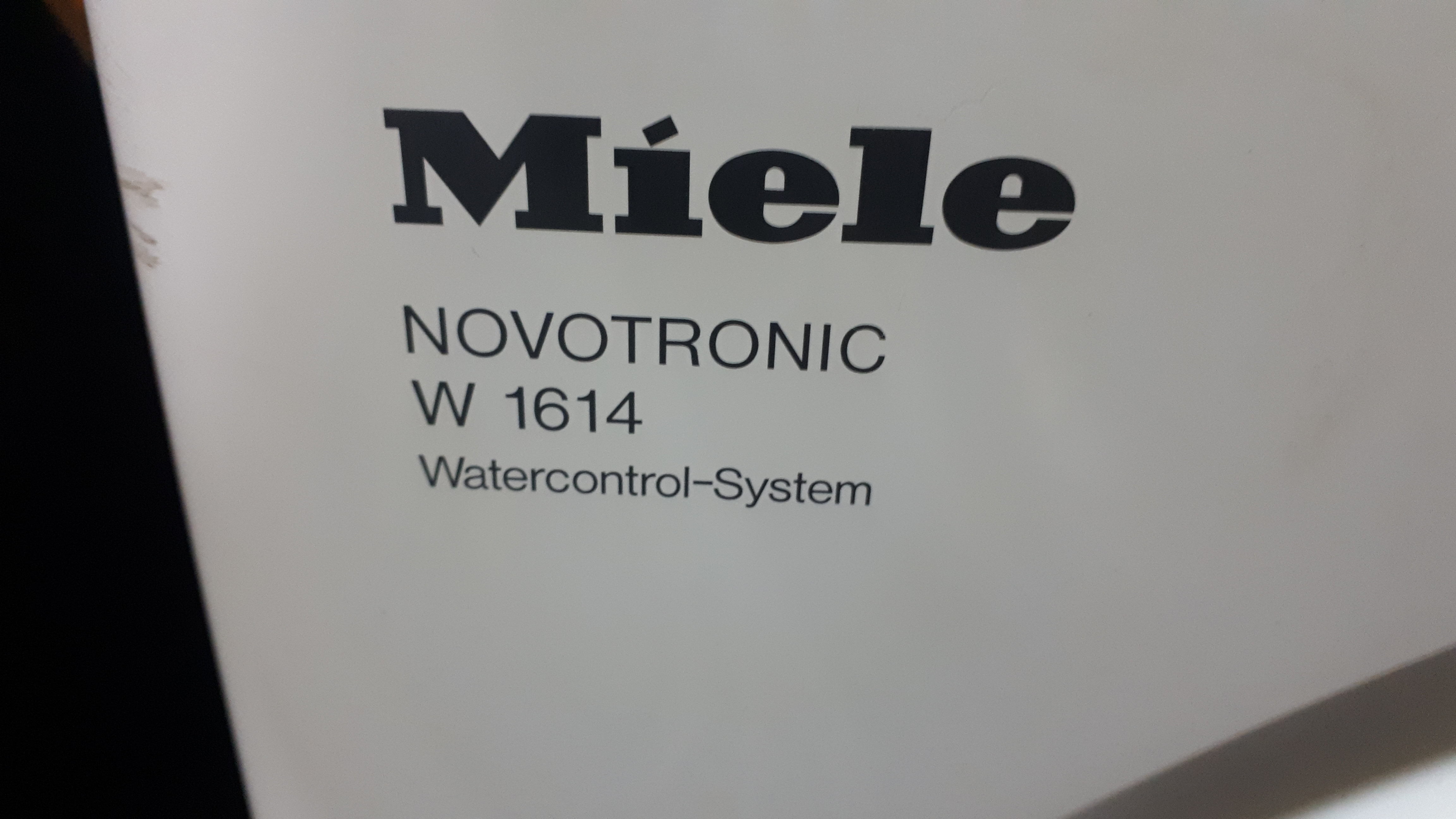 Miele W1614 - brak reakcji na przycisk otwierania drzwi, zamek i ...