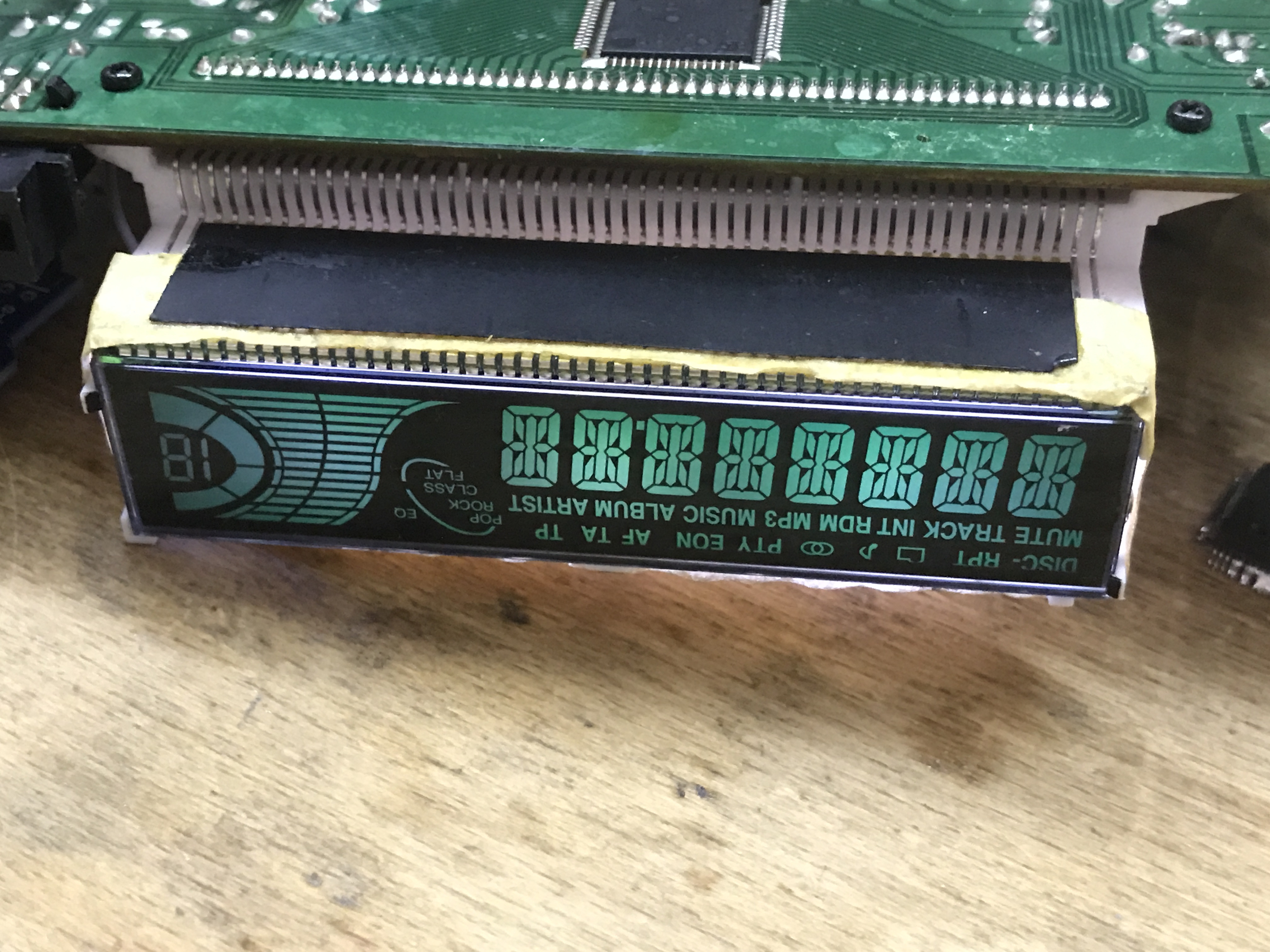 Inside a car radio, running LCD with PT6523 on Arduino