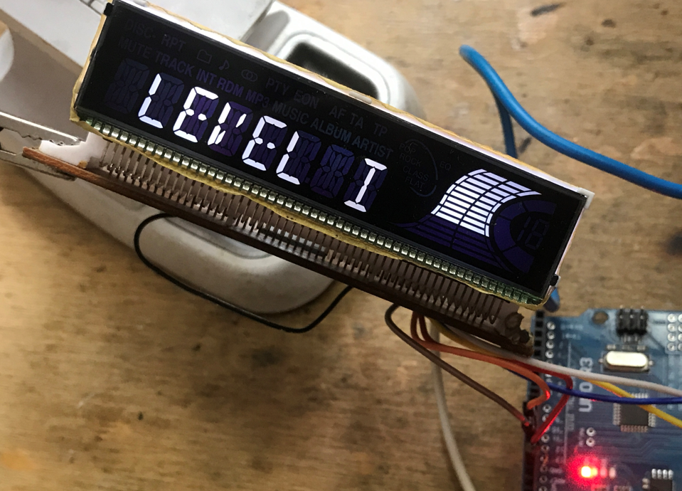 Inside a car radio, running LCD with PT6523 on Arduino