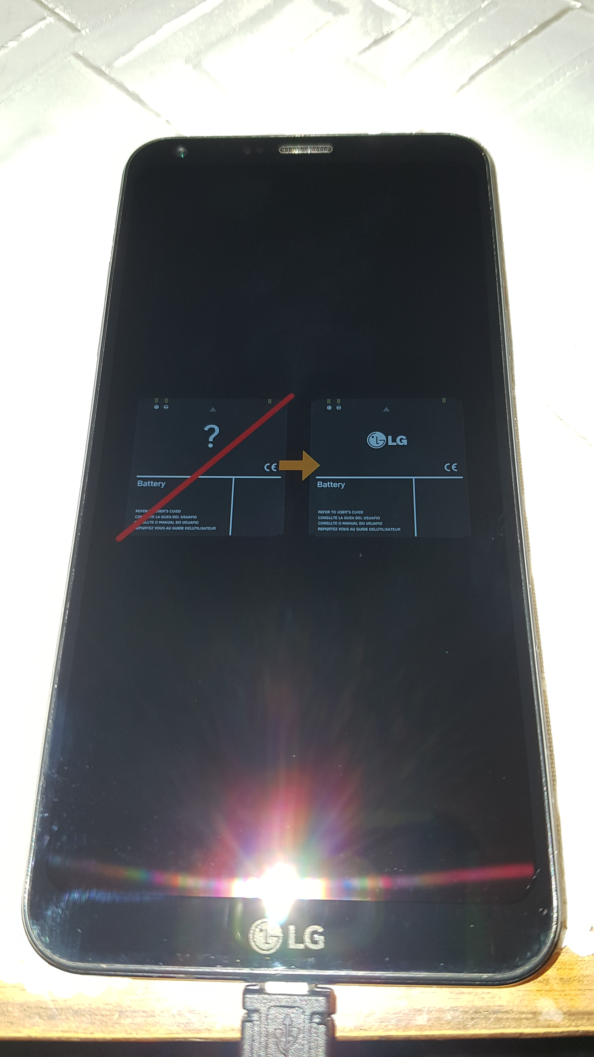 LG Q6 Battery Not Charging & Red Question Mark: Will Changing the ...