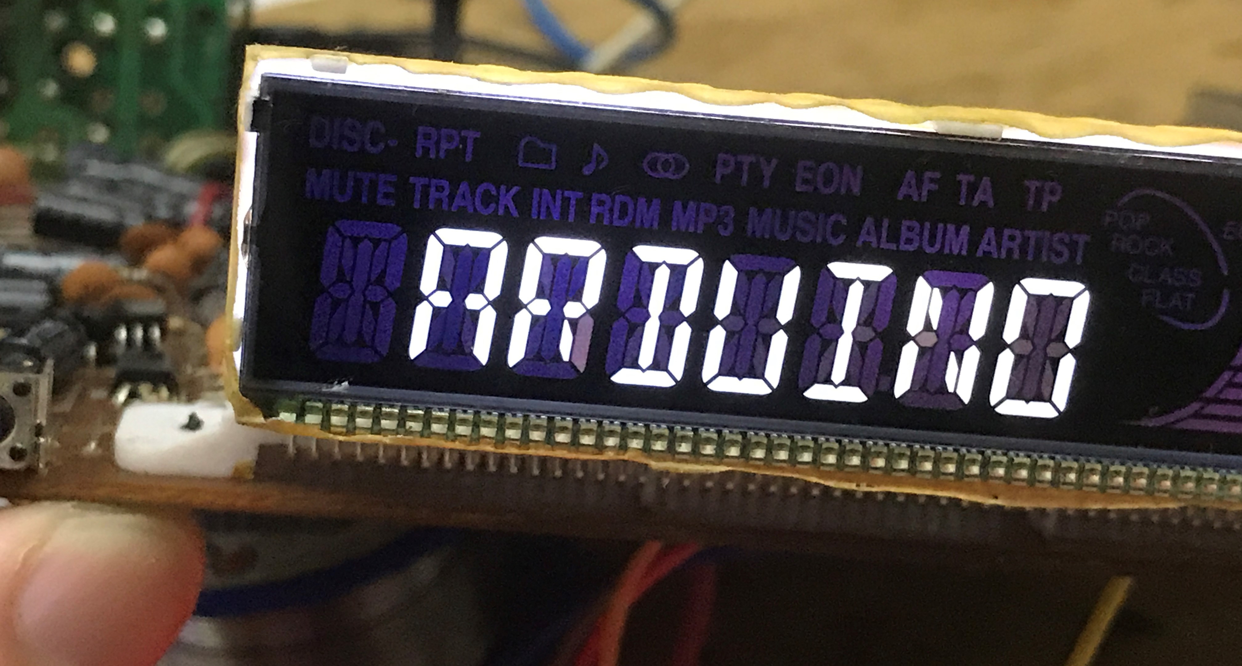 Inside a car radio, running LCD with PT6523 on Arduino