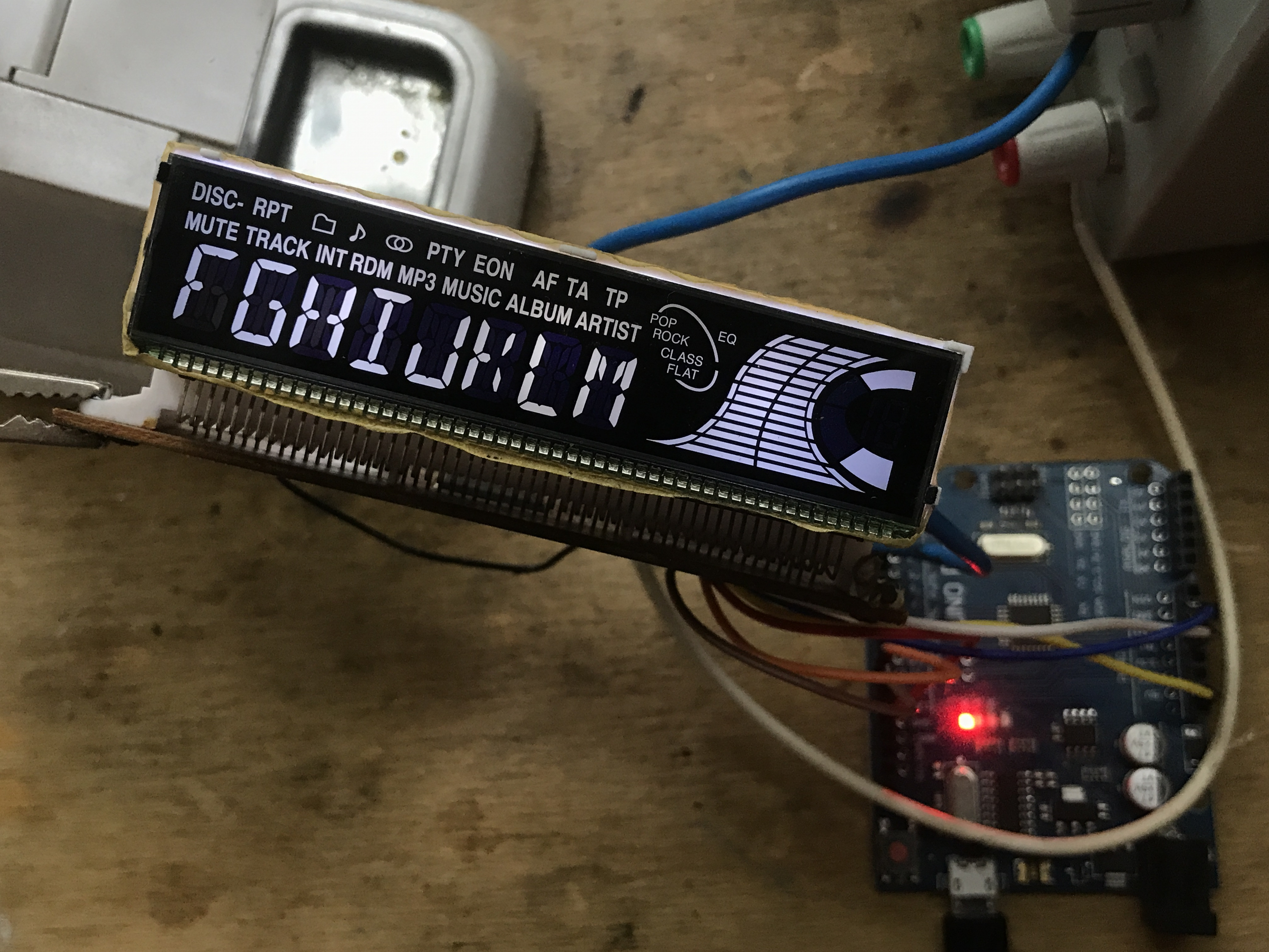 Inside a car radio, running LCD with PT6523 on Arduino